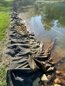 What is a retention pond and why is maintenance important?